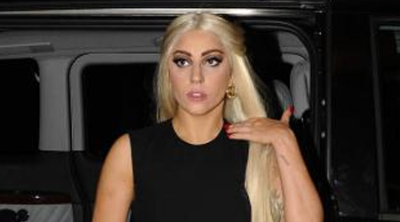 Gaga unveils prison tattoo | nowrunning
