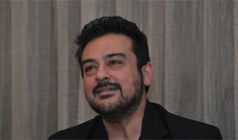 Adnan Sami in writing mode | nowrunning